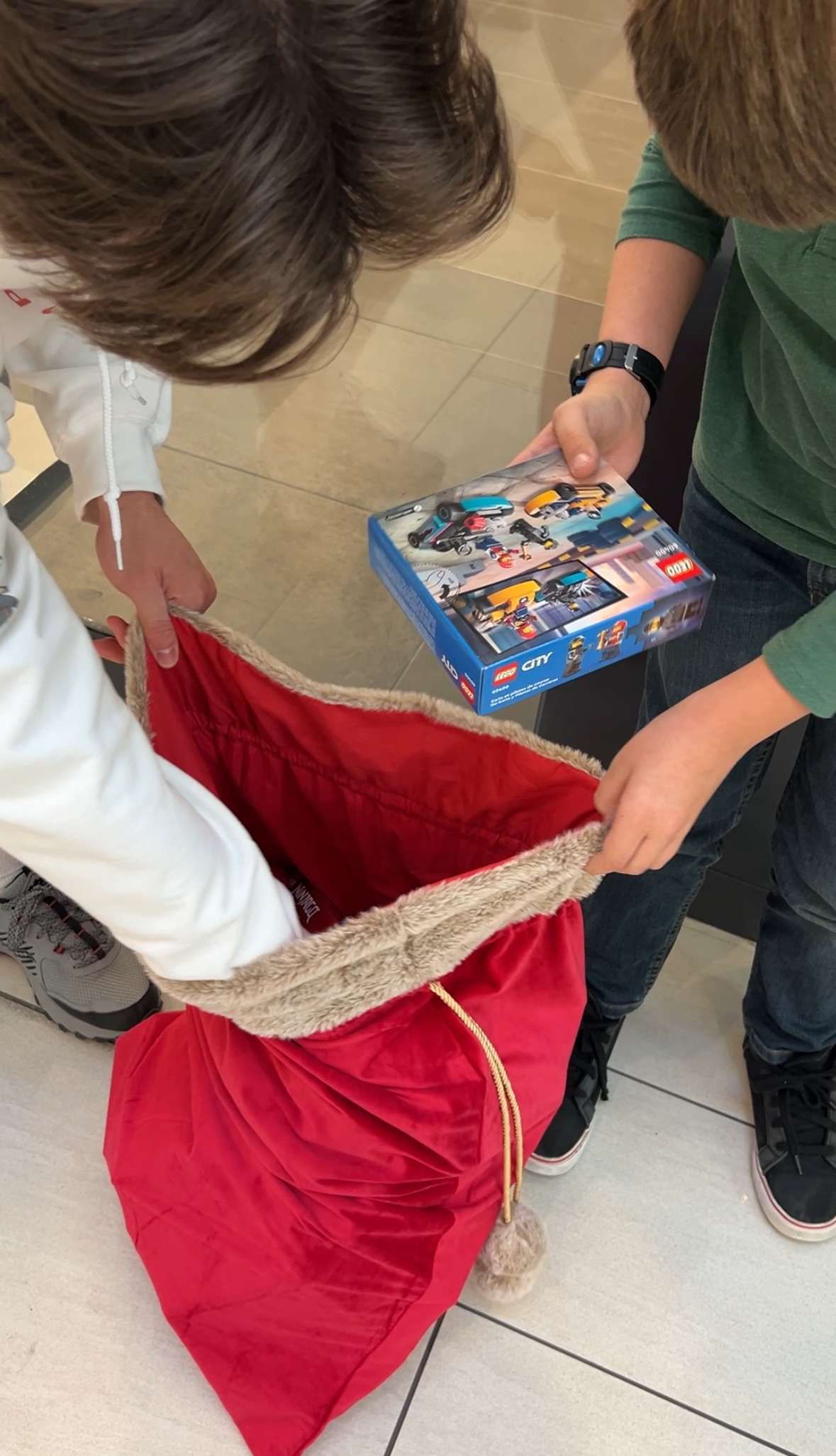 Kid receiving Lego set 3